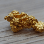 Gold Retreats as Renewed U.S.-Iran Conflict Boosts Inflation and Rate ...